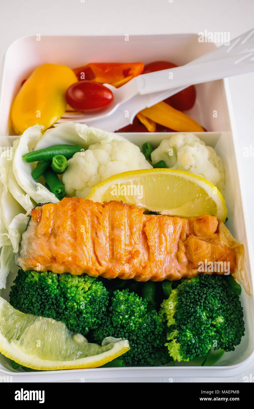 Lunch box with food on wooden background, top view Stock Photo - Alamy