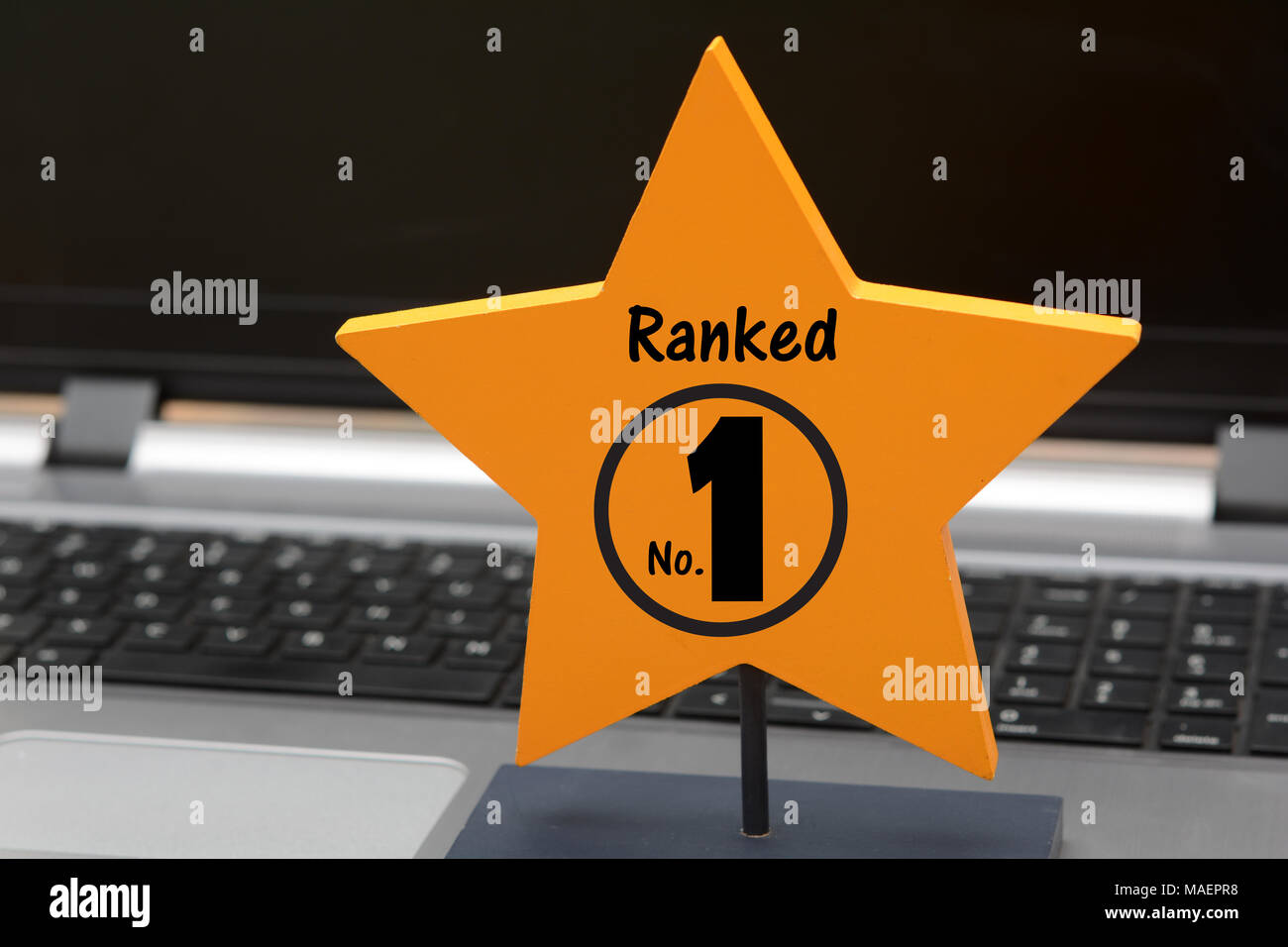 Ranked Number 1 sign on Yellow Star Stock Photo - Alamy