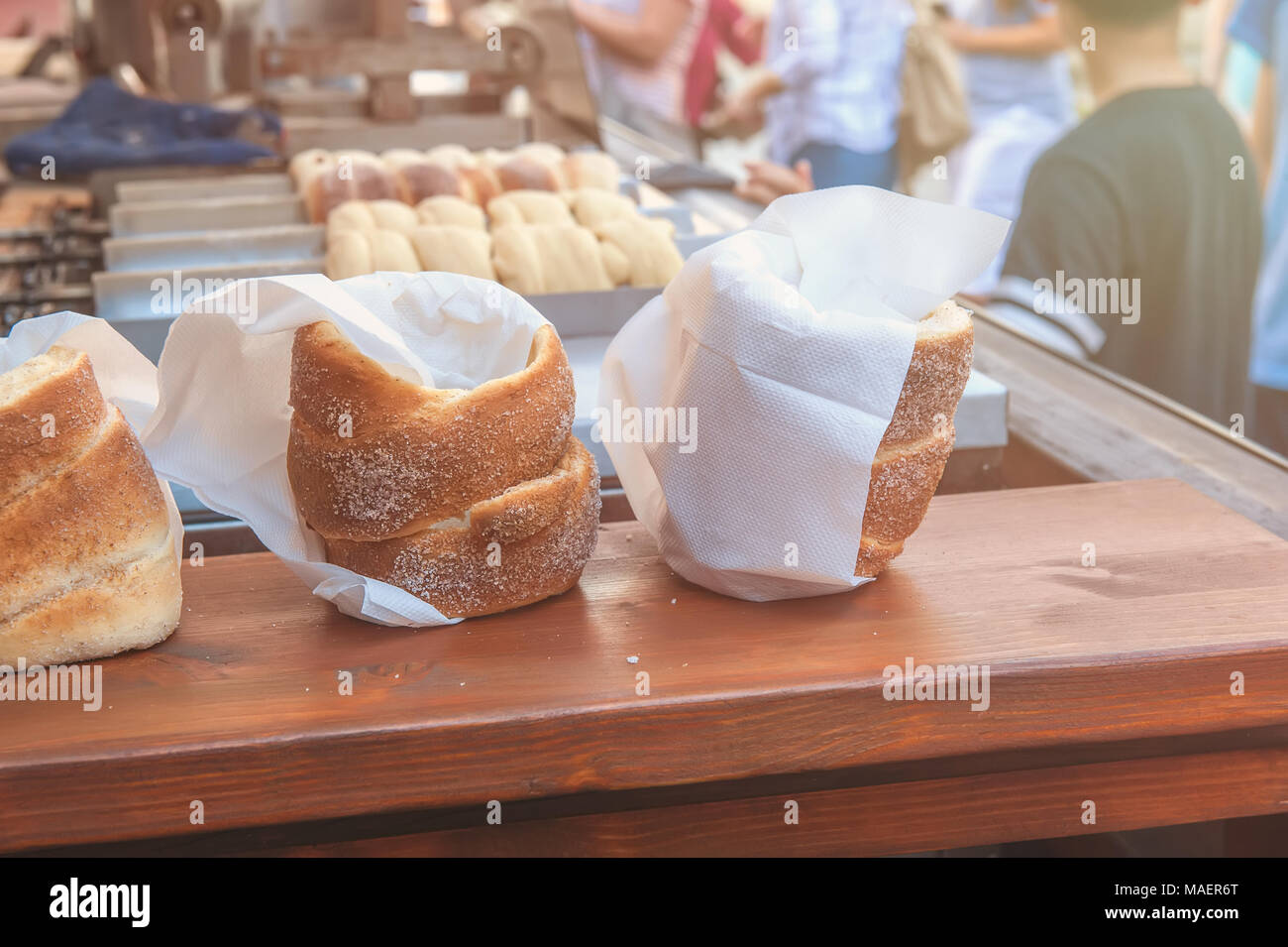 Sold trdelnik on the counter. Manufacturer trdelnik on the streets of ...