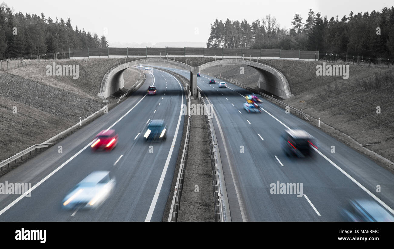 Cars traveling on a highway in landscape. Idea of transport ...