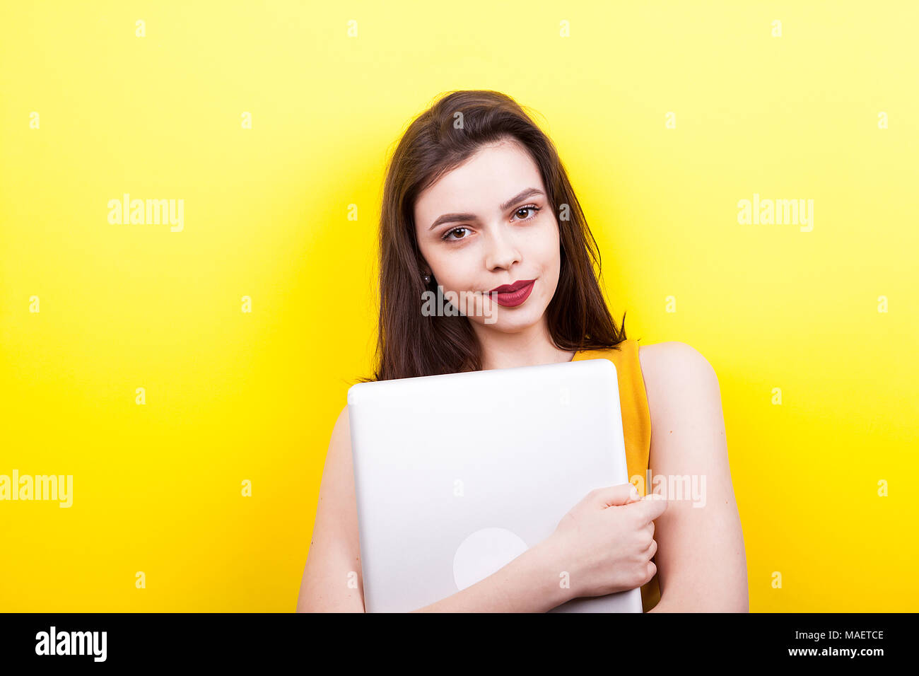 Portrait students holding laptop hi-res stock photography and images ...