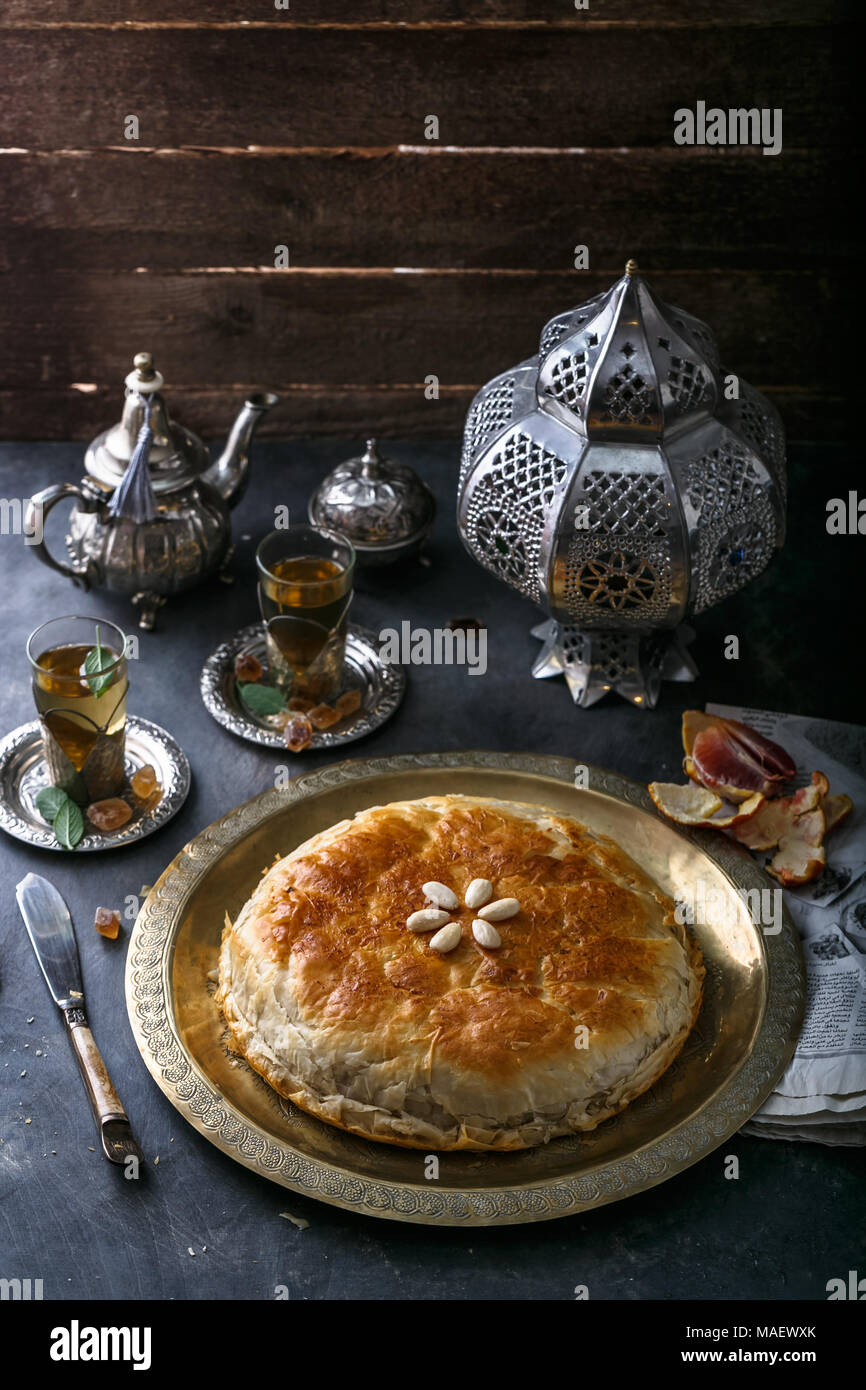 Fresh baked Moroccan chicken pastilla or bastilla Stock Photo - Alamy