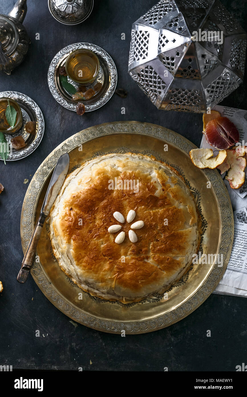Phyllo pastry pie with chicken and spices. Arabian cuisine Stock Photo ...