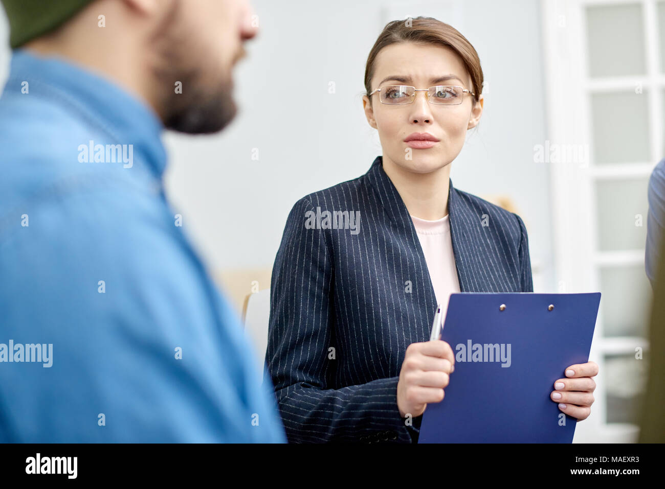 Attractive Psychologist Working with Patient Stock Photo - Alamy