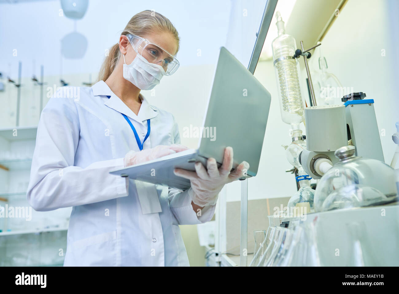 Scientist researcher using laboratory hi-res stock photography and ...