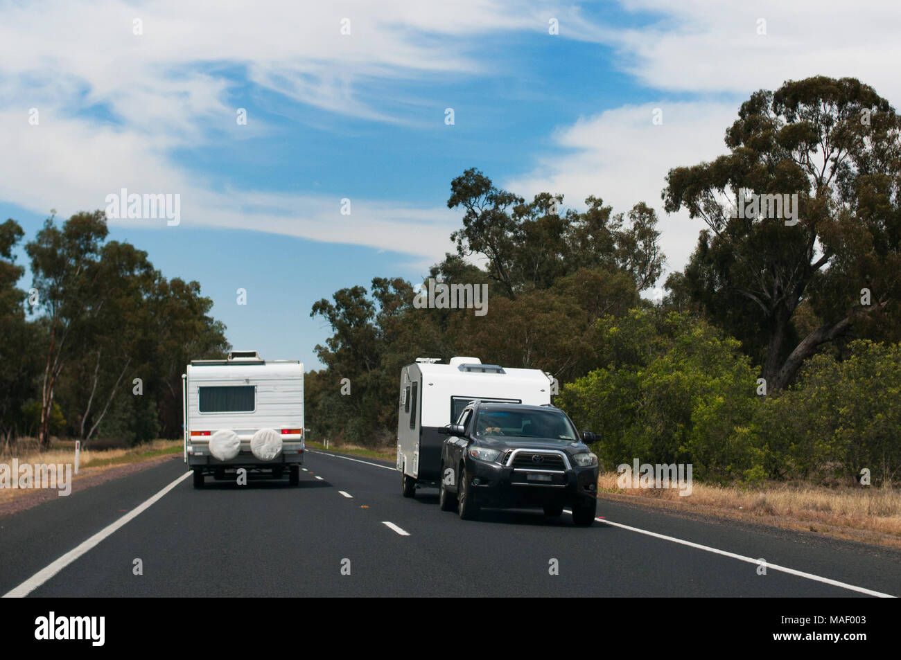 Caravans on an outback Australian road Stock Photo - Alamy