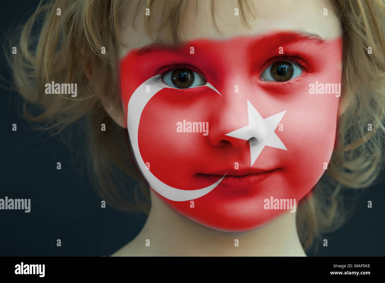 Portrait of a child with a painted turkish flag Stock Photo - Alamy