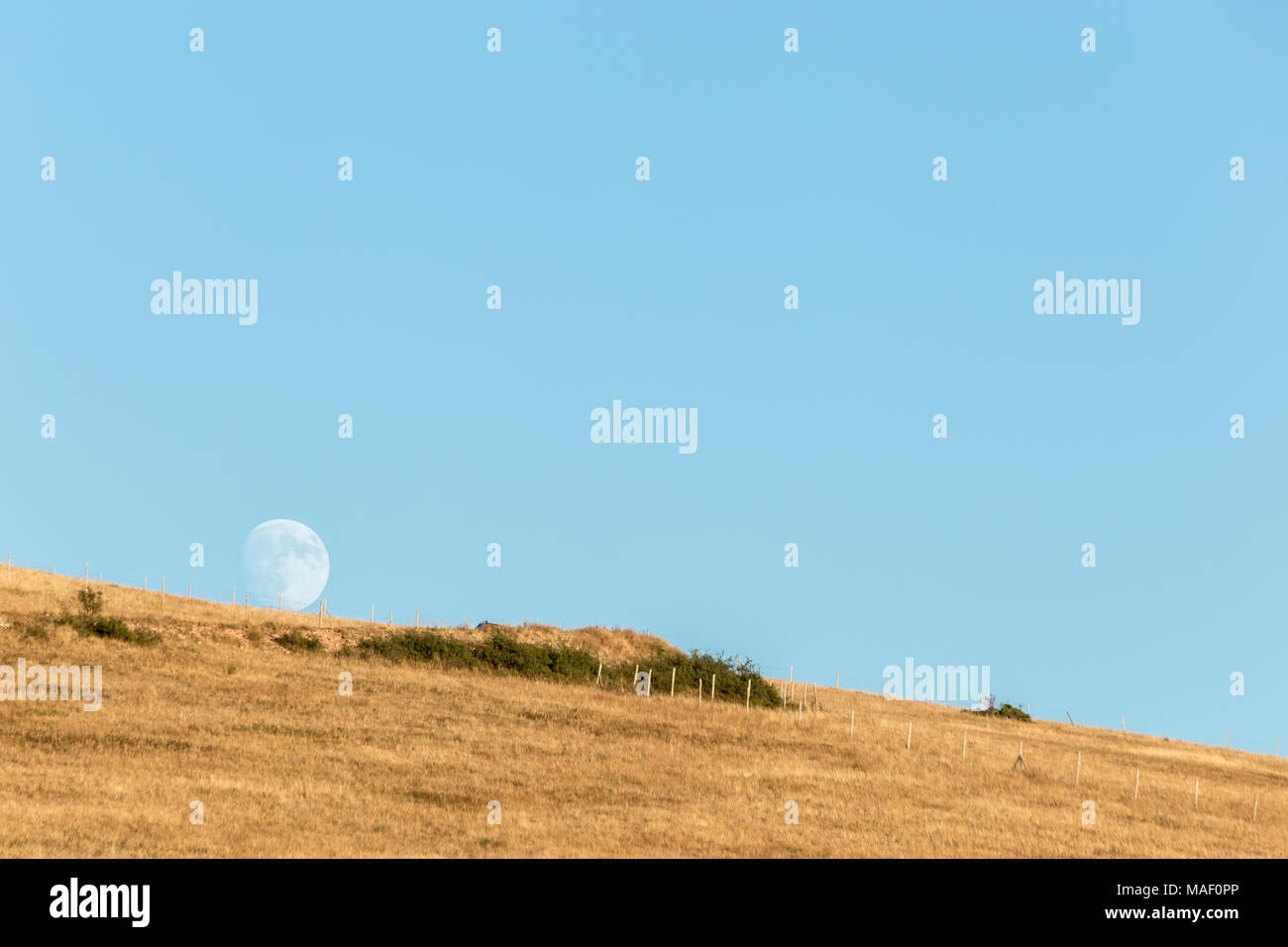 Moon rising behind the hill hi-res stock photography and images - Alamy