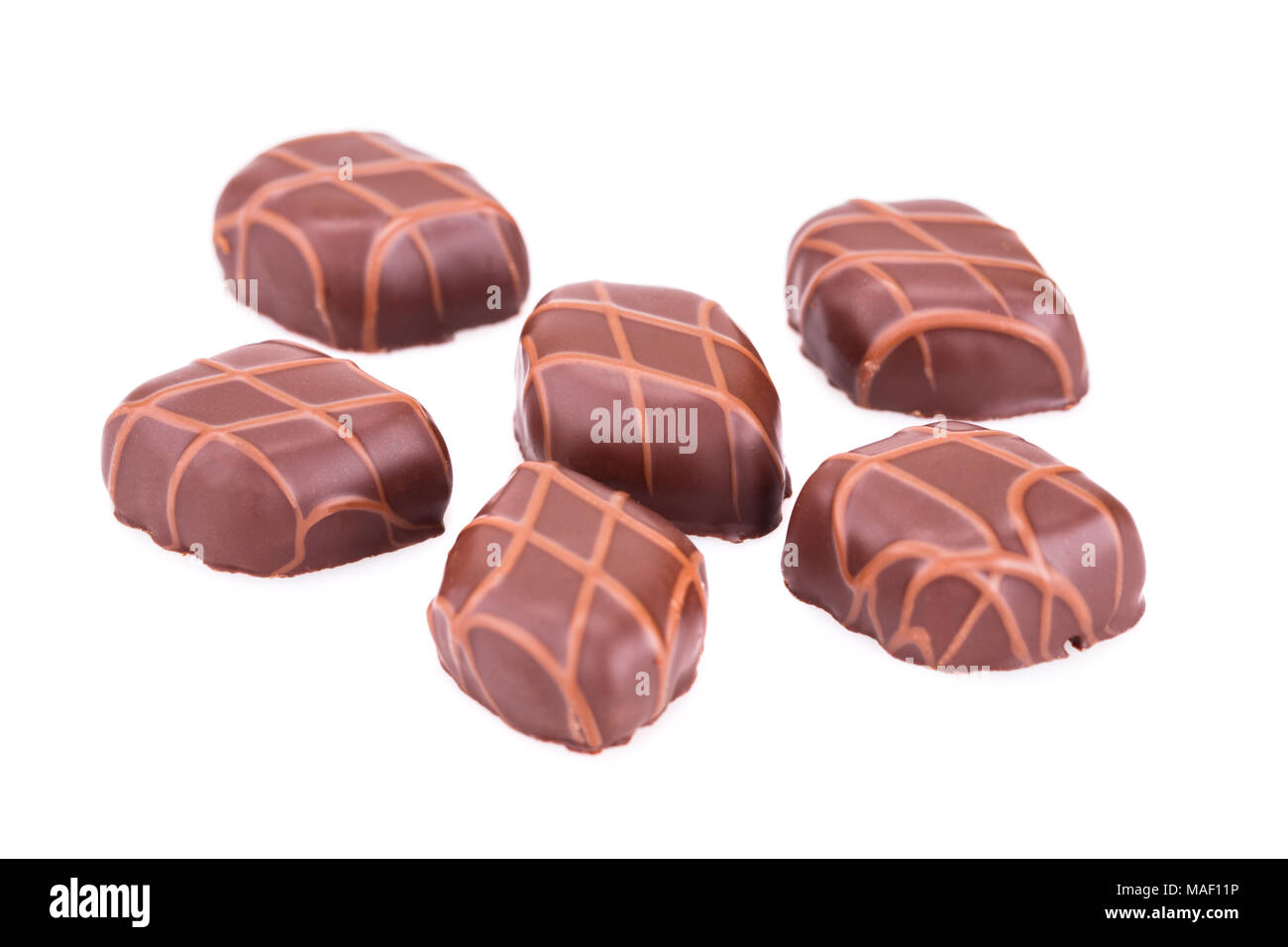 Heap of chocolate isolated on white background Stock Photo - Alamy