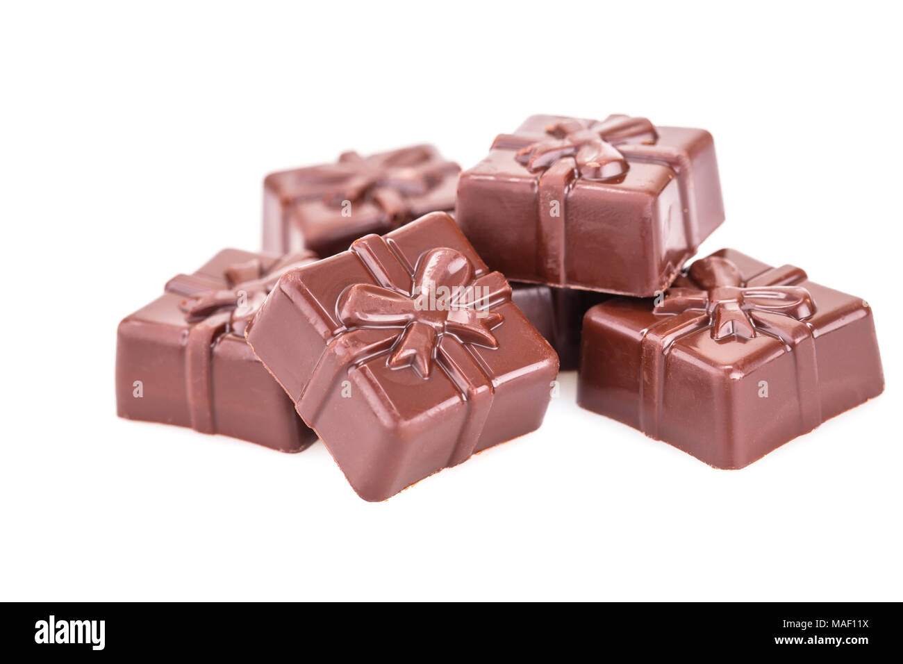 Heap of chocolate isolated on white background Stock Photo - Alamy