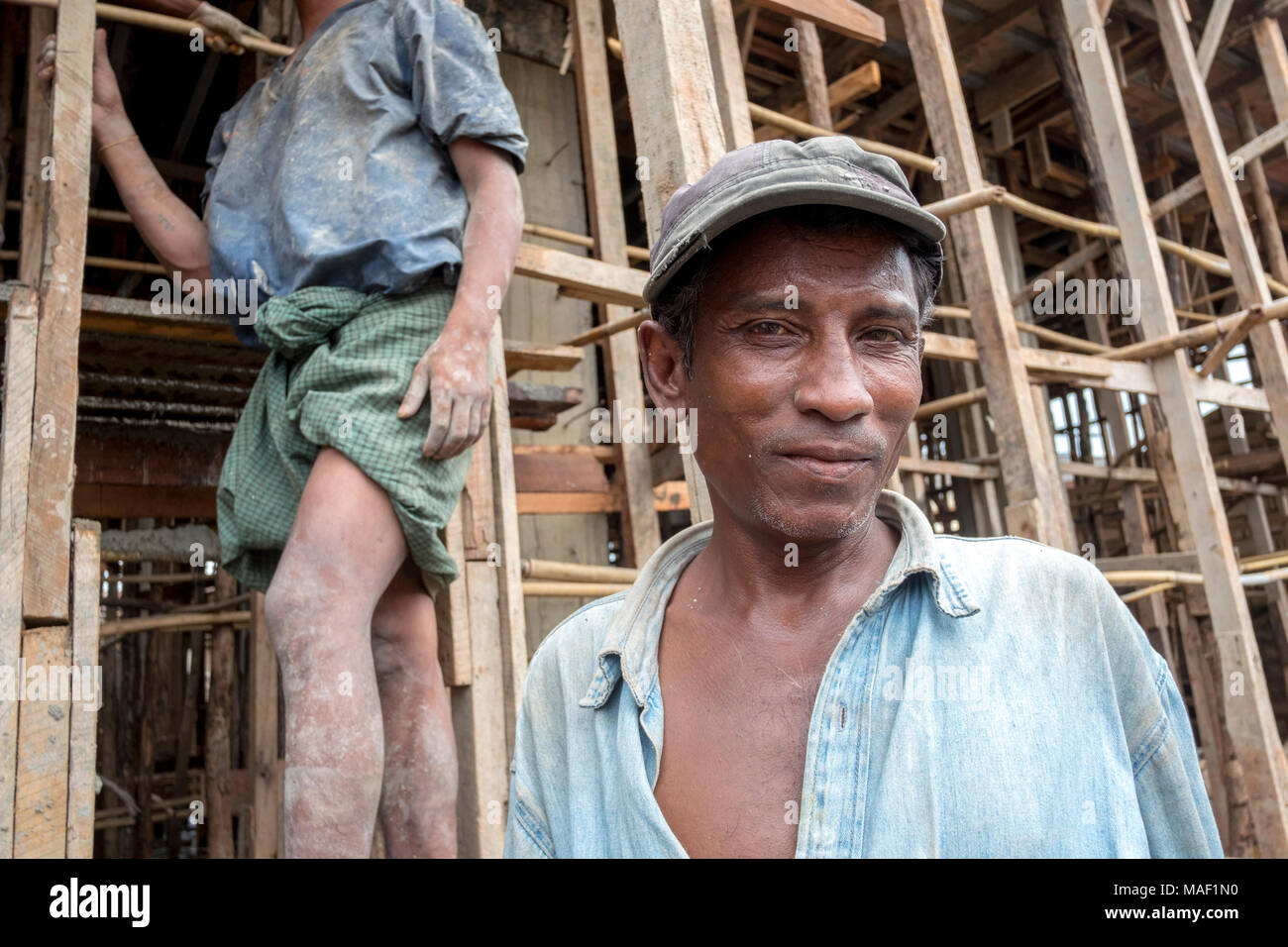 Construction workers on a building site. Lashio, Shan State, Myanmar ...