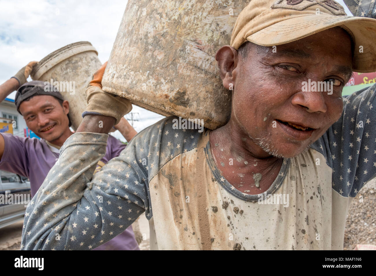 Construction workers on a building site. Lashio, Shan State, Myanmar ...