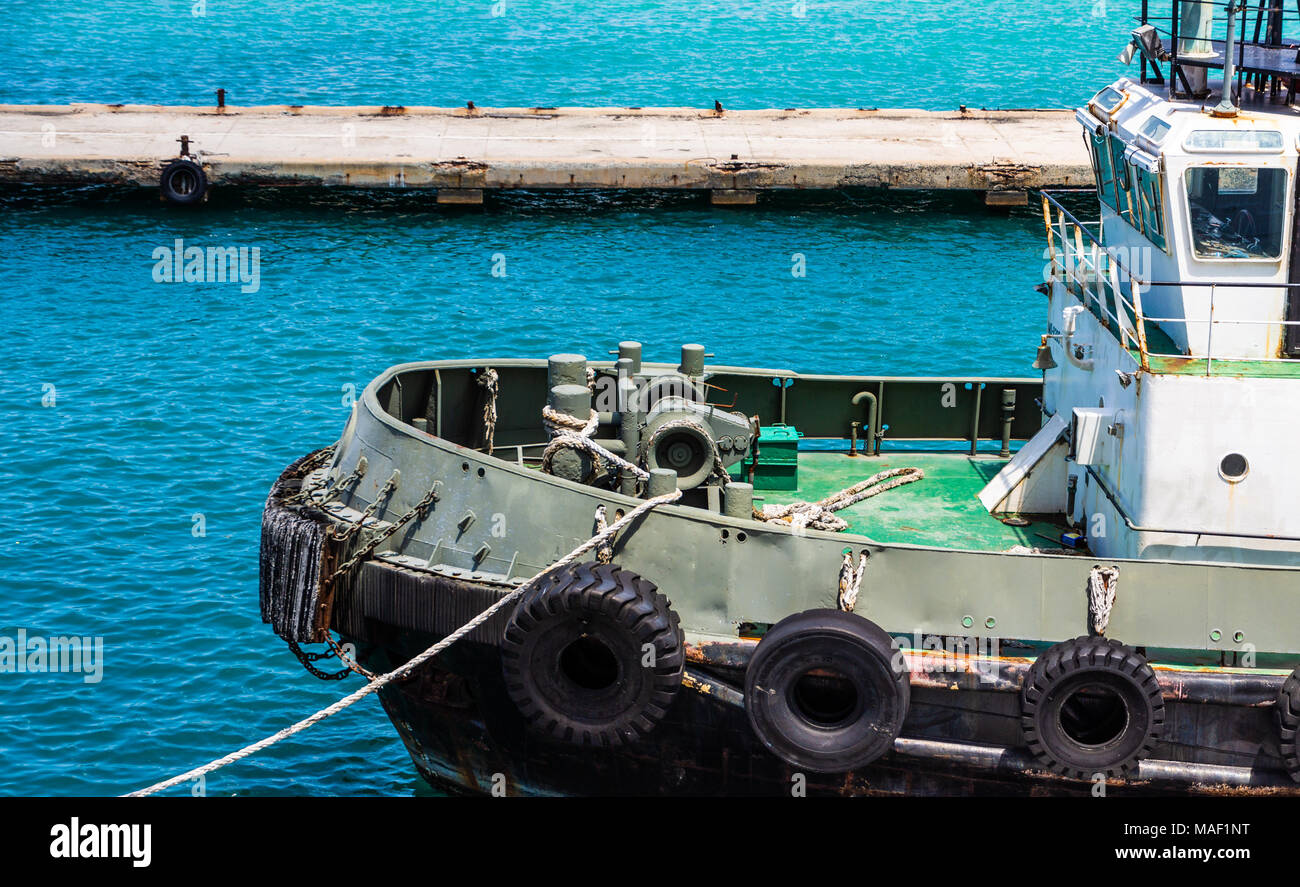 A heavy tugboat tied up at the dock on Aruba Stock Photo - Alamy