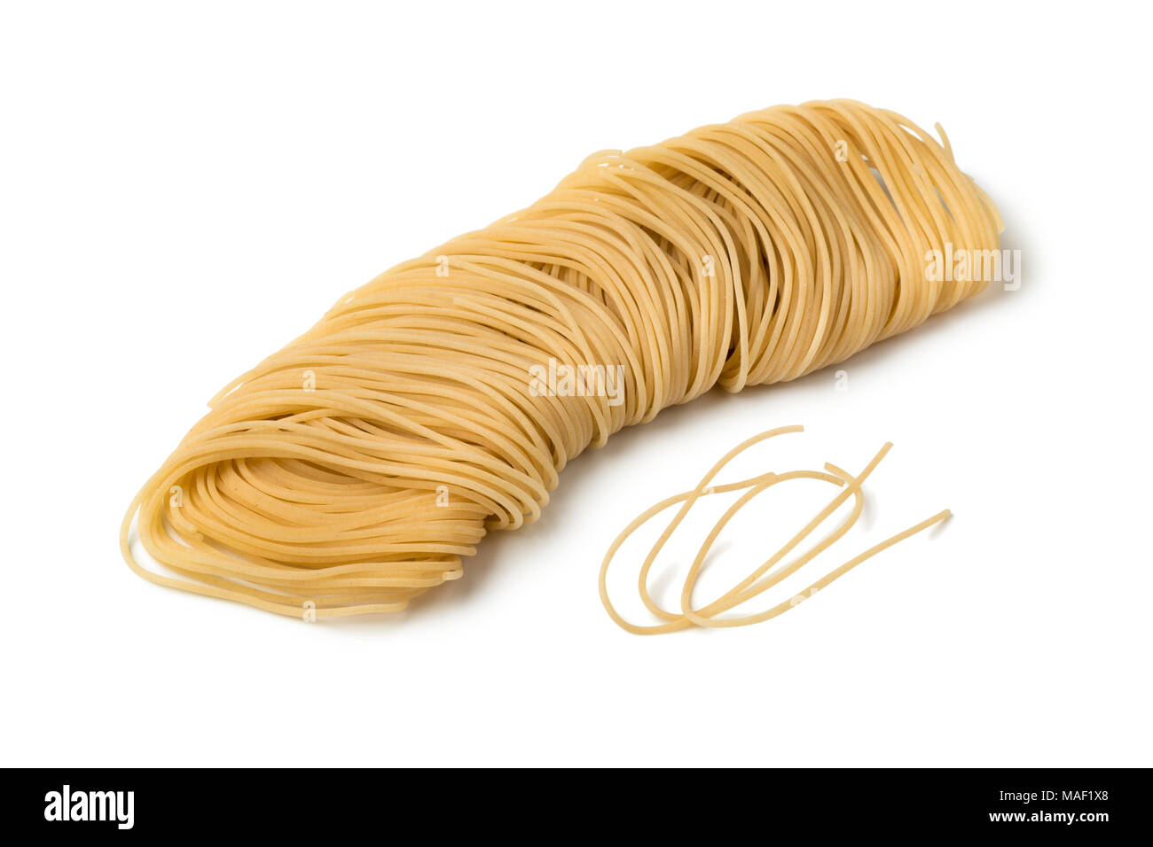 Long shaped raw vermicelli isolated on white background Stock Photo - Alamy