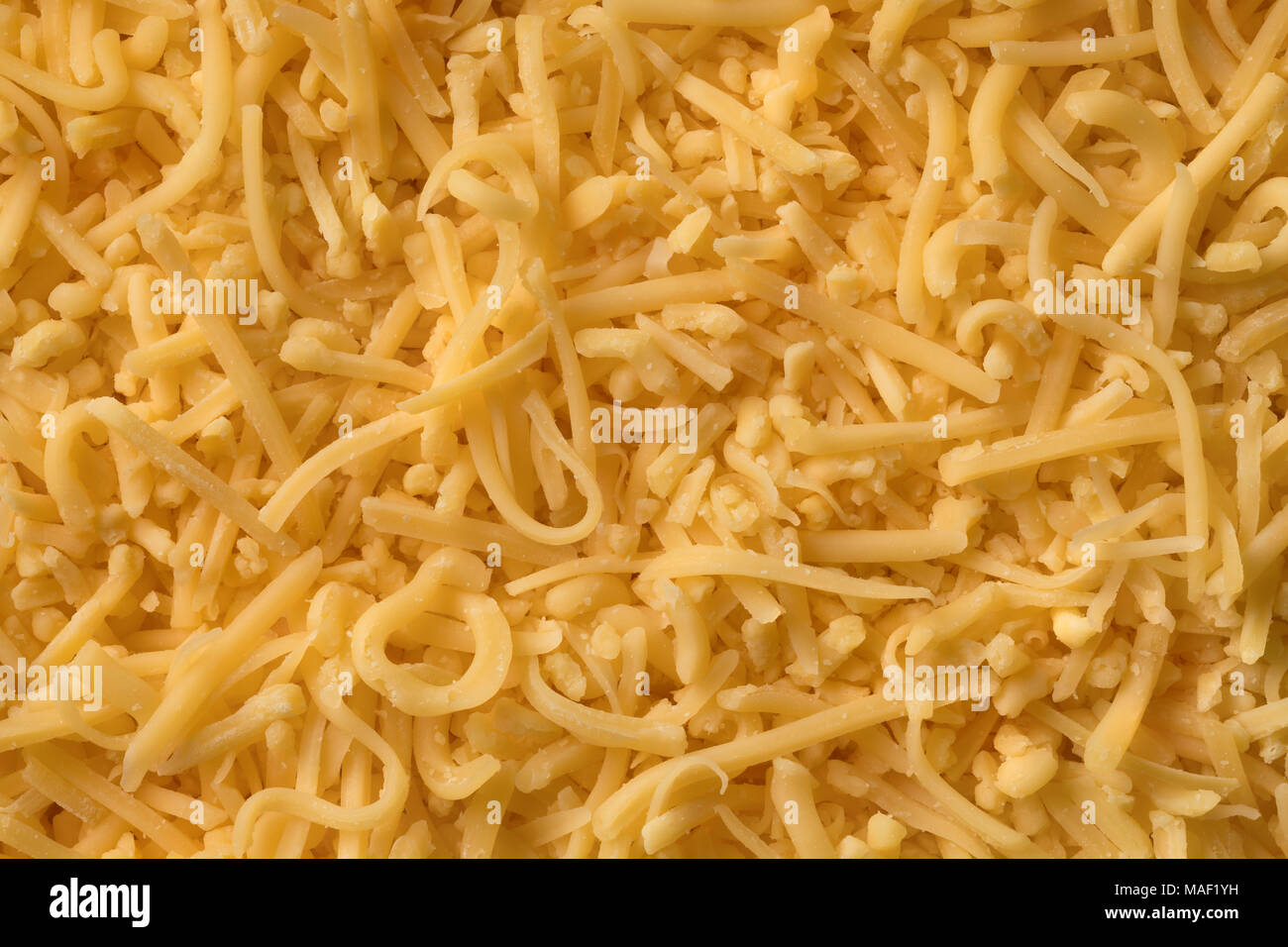 Grated Dutch Gouda cheese full frame,close up Stock Photo - Alamy