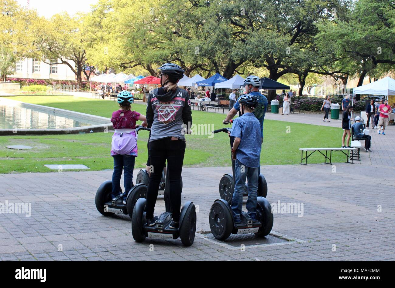 a family group on segways in a houston park texas USA Stock Photo - Alamy