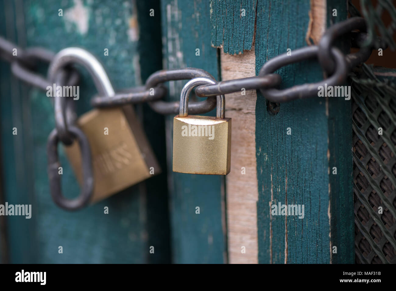 Security gate locks hi-res stock photography and images - Alamy