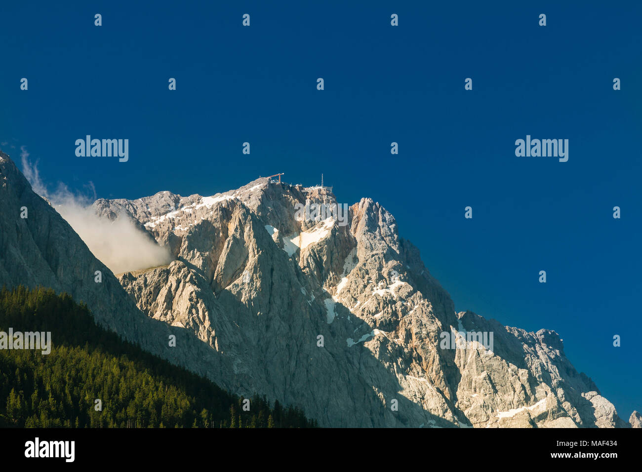 View to the summit of the Zugspitze, Germany seen from Grainau Stock ...