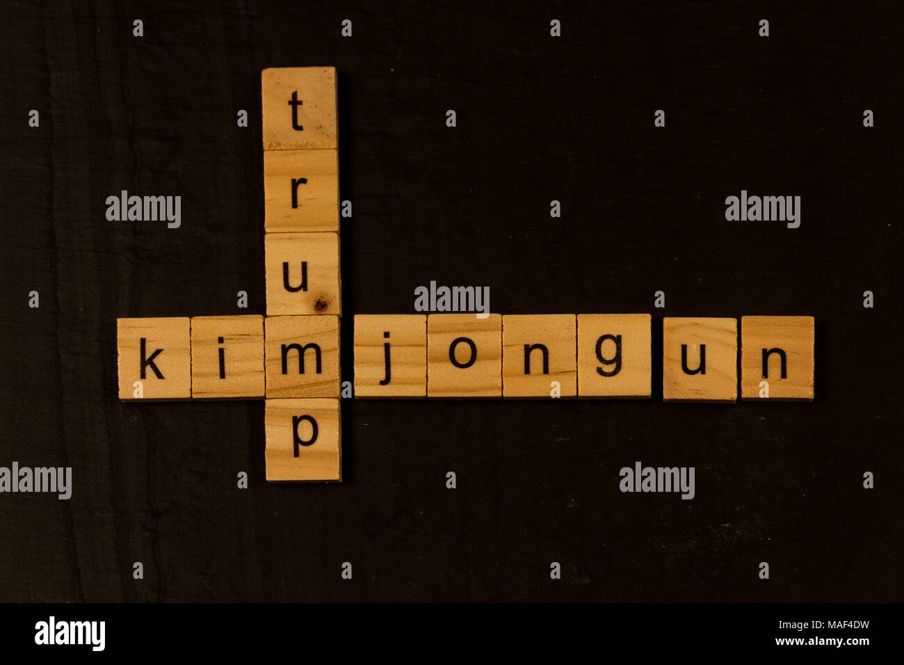 Toy letter blocks showing Trump and Kim Jong Un like a crossword Stock ...