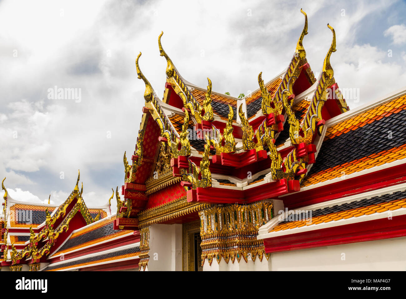 Cho Fa or Chofa finials on roof of Buddhist Temple Stock Photo - Alamy