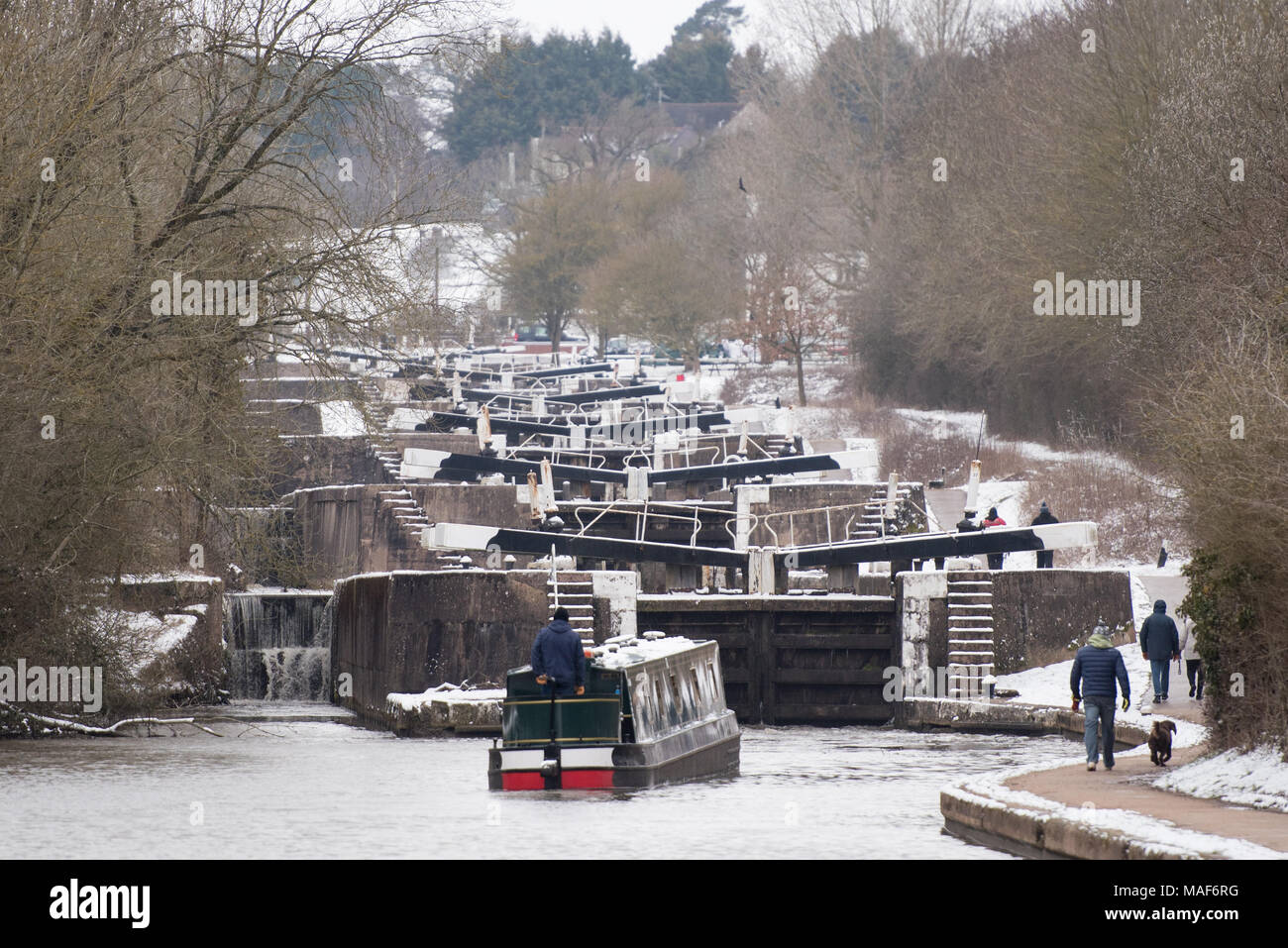 Hatton, Warwickshire, UK. 18th March 2018. Walkers and canal boat ...