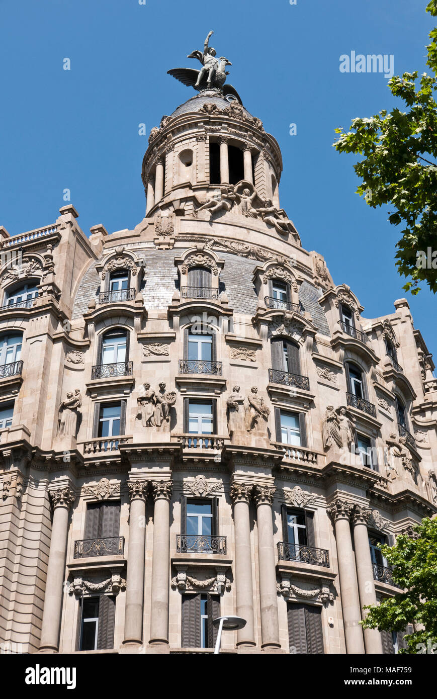 A building decorated with classical statues in Barcelona, Spain Stock ...