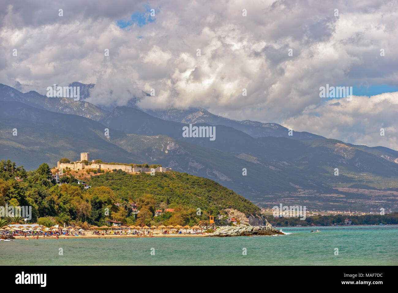 Medieval fortress and resort beach near Platamonas in Greece Stock ...