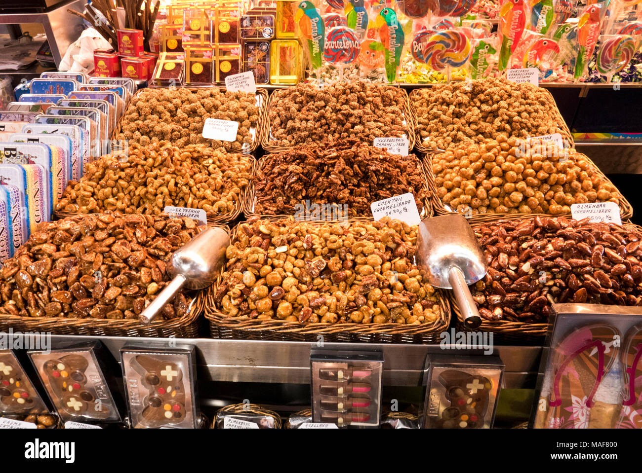 A large variety of Nuts for sale in La Boqueria indoor market near La ...