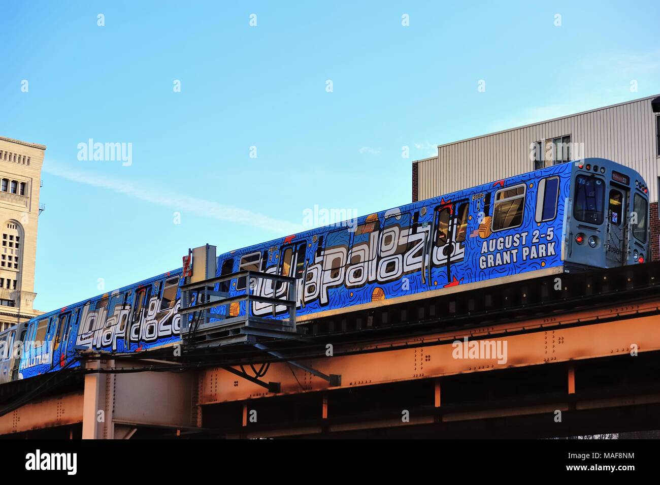 Chicago, Illinois, USA. A CTA rapid transit train brightly adorned with ...
