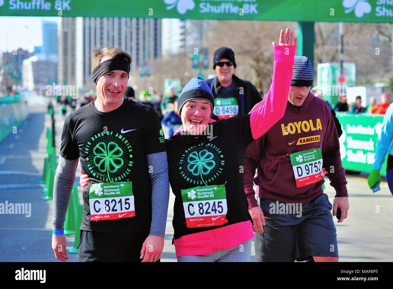 Chicago, Illinois, USA. Happy runners after crossing the finish line at ...