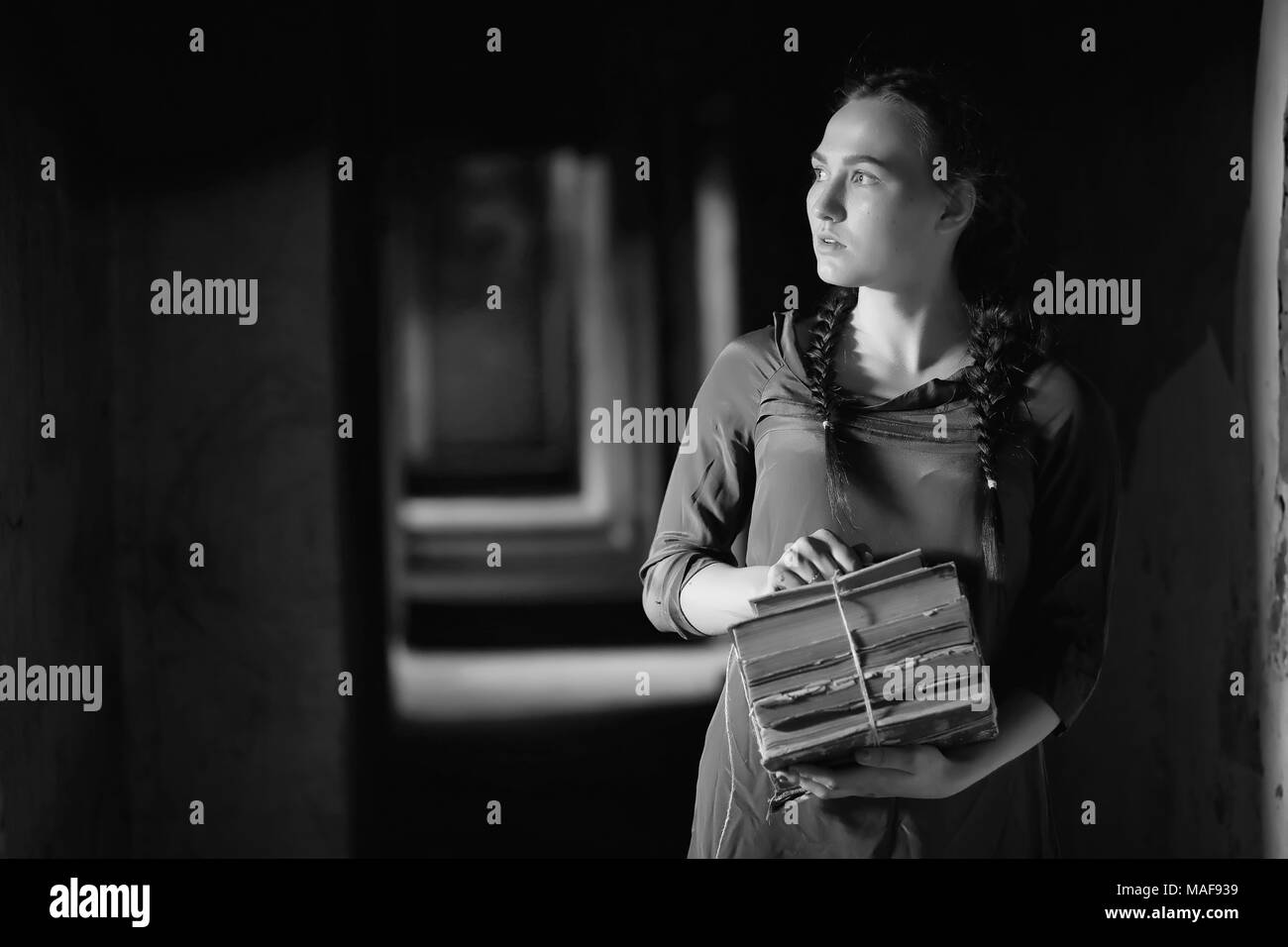 Retro girl in the old house reading books and writing a story Stock ...