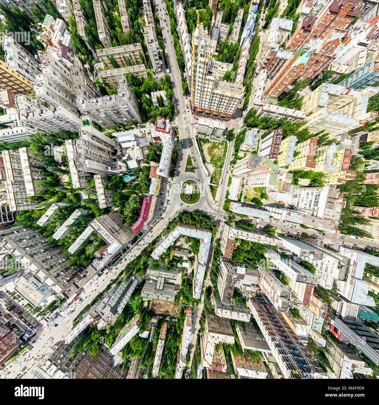 Aerial city view with crossroads and roads, houses, buildings, parks ...