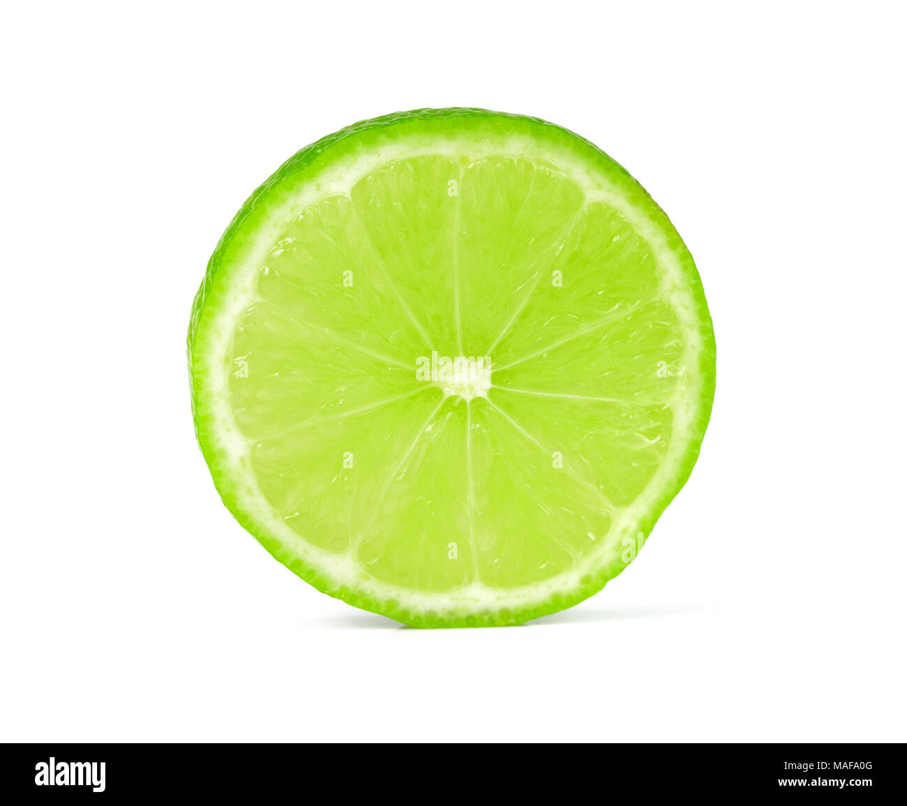 Lime sliced isolated on white Stock Photo - Alamy
