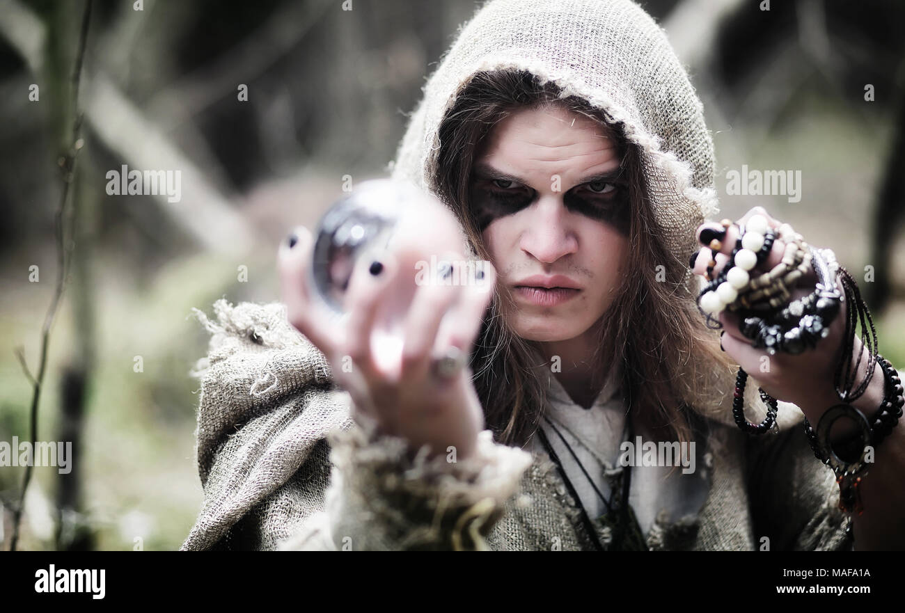 Fairy magician. A sorcerer with a glass sphere, a magical spell and a ...