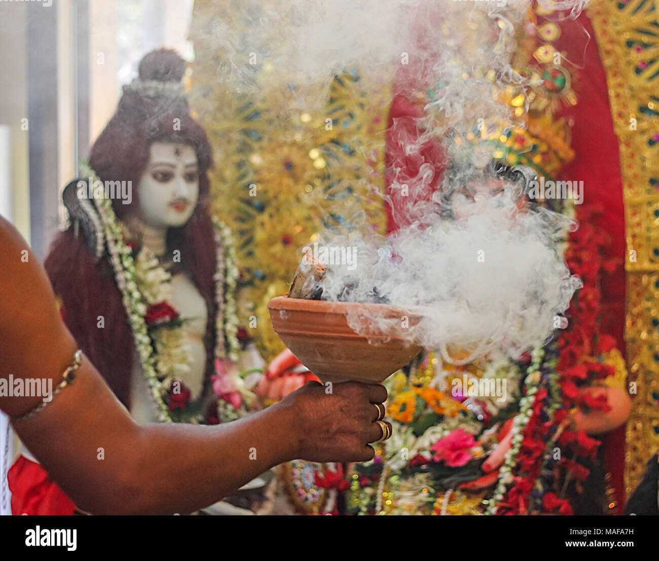 worship of indian god godess idol dhoop dhuno dhunichi durga puja with ...