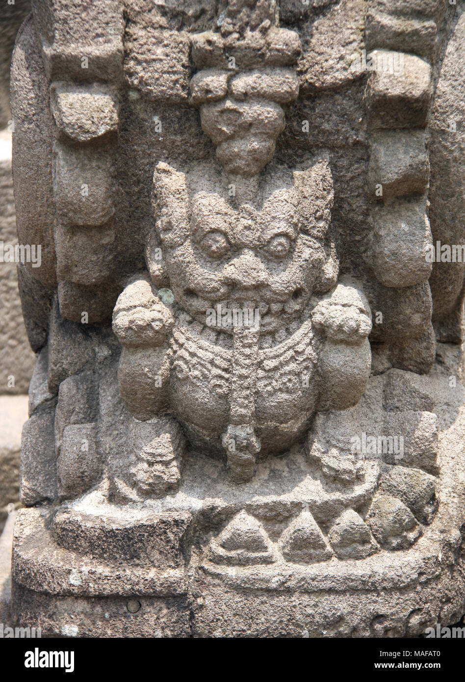 Ancient stone bas-relief with lion, Buddist temple Borobudur ...