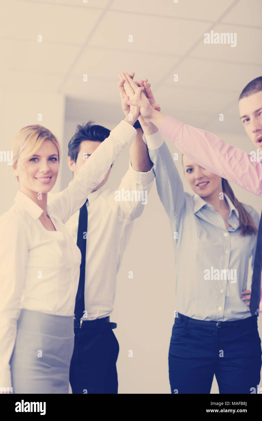 business people group joining hands and representing concept of friendship and teamwork, low ...