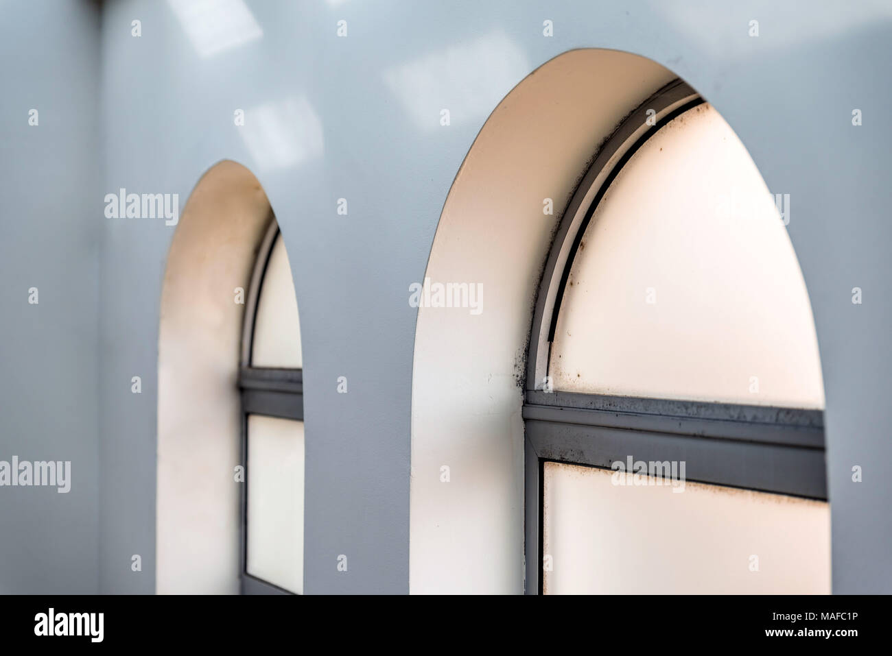 Day view high office windows with blurred glass indoor Stock Photo - Alamy