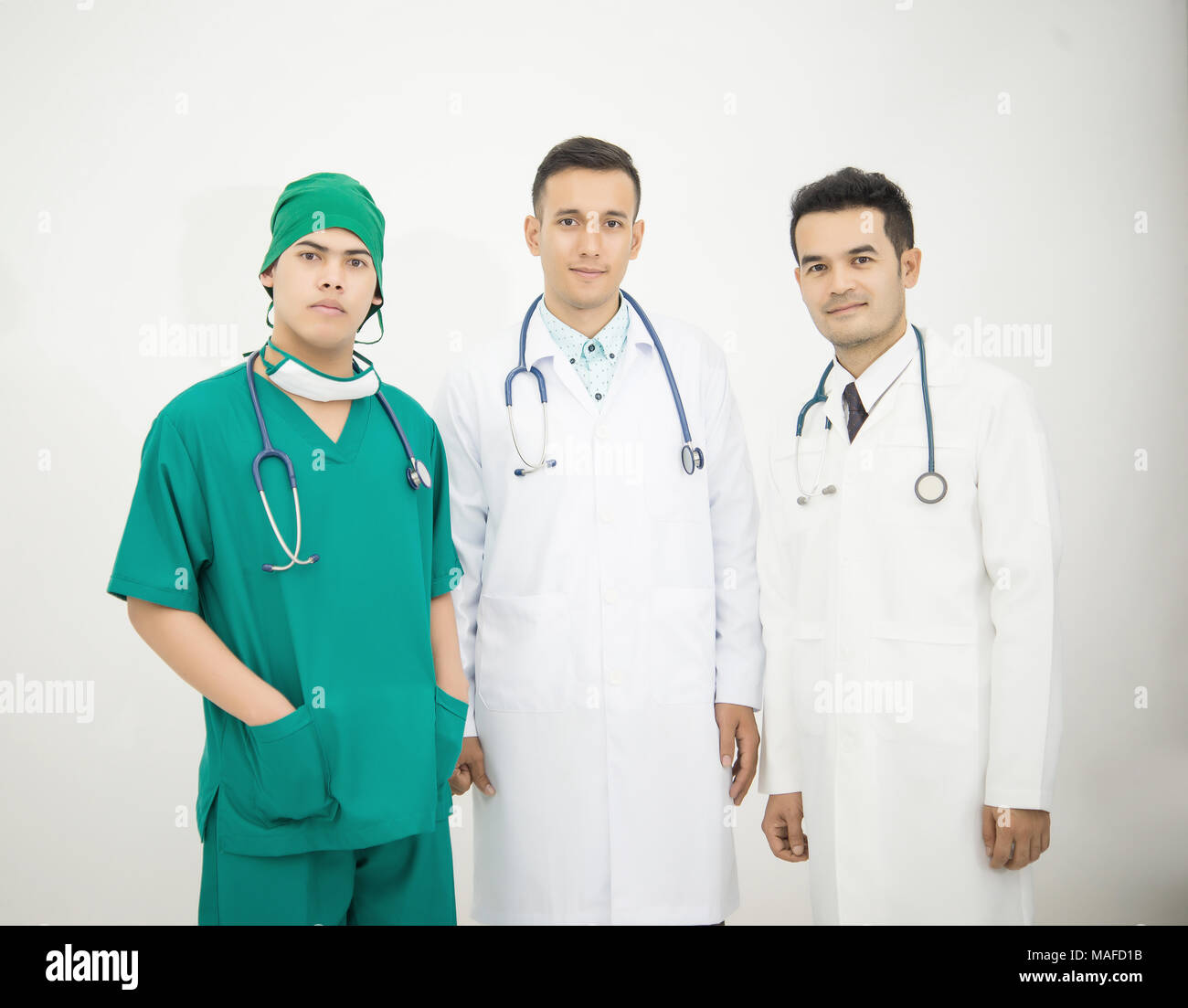 Group of medical doctor with stethoscopes over on white background ...
