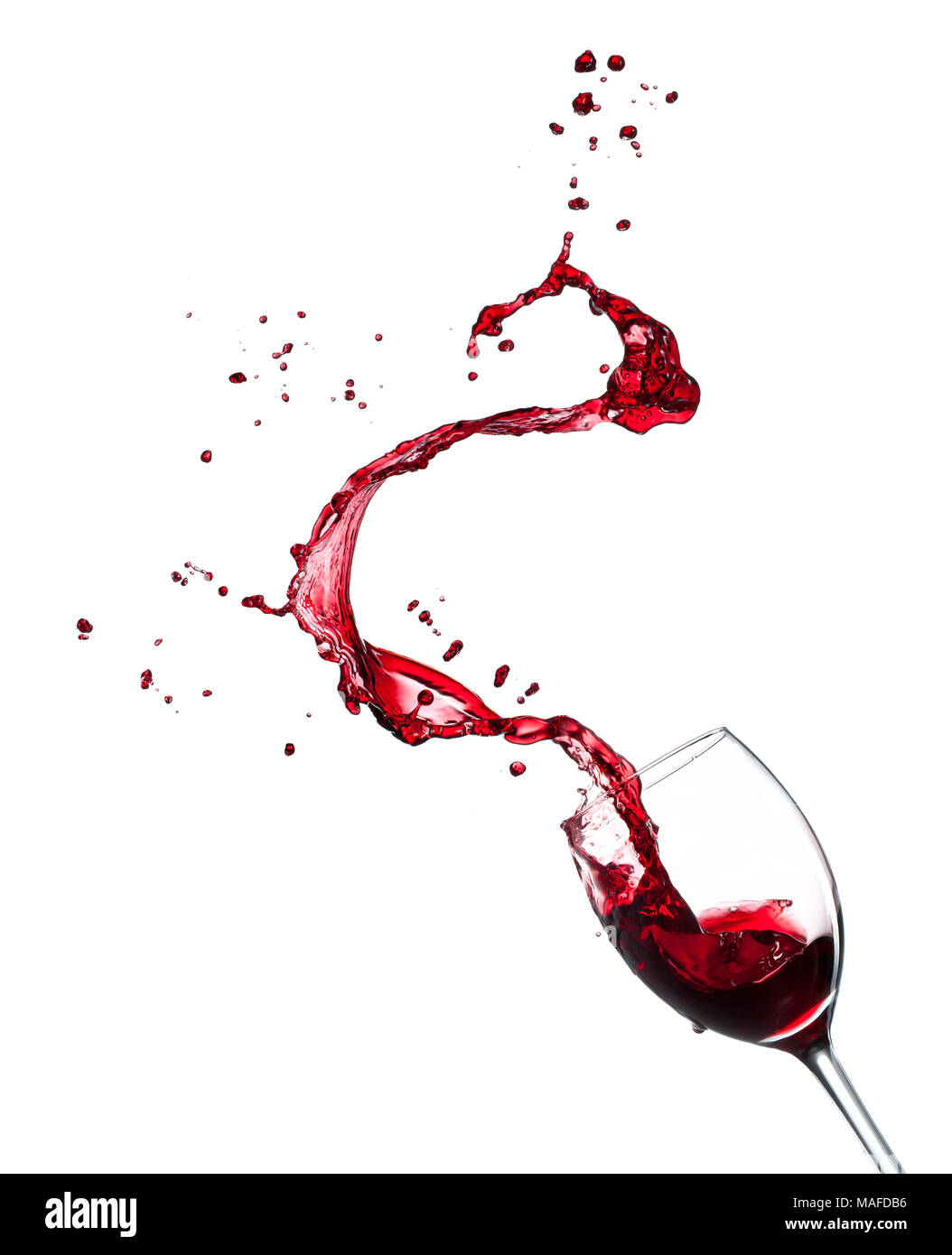 Red wine splashing from glass, isolated on white background. High ...