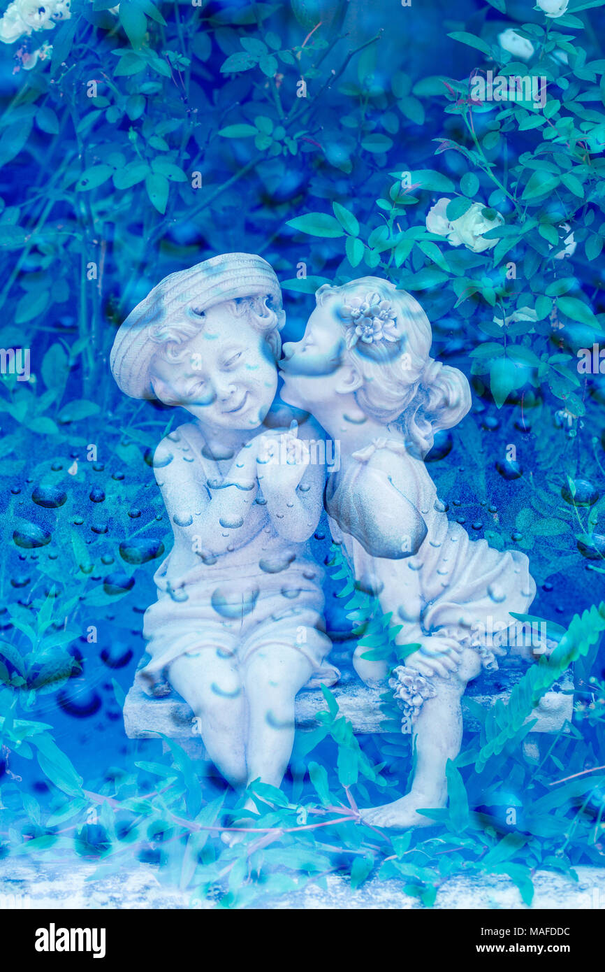Vintage picture of Boy and girl statues with drop water filter Stock ...