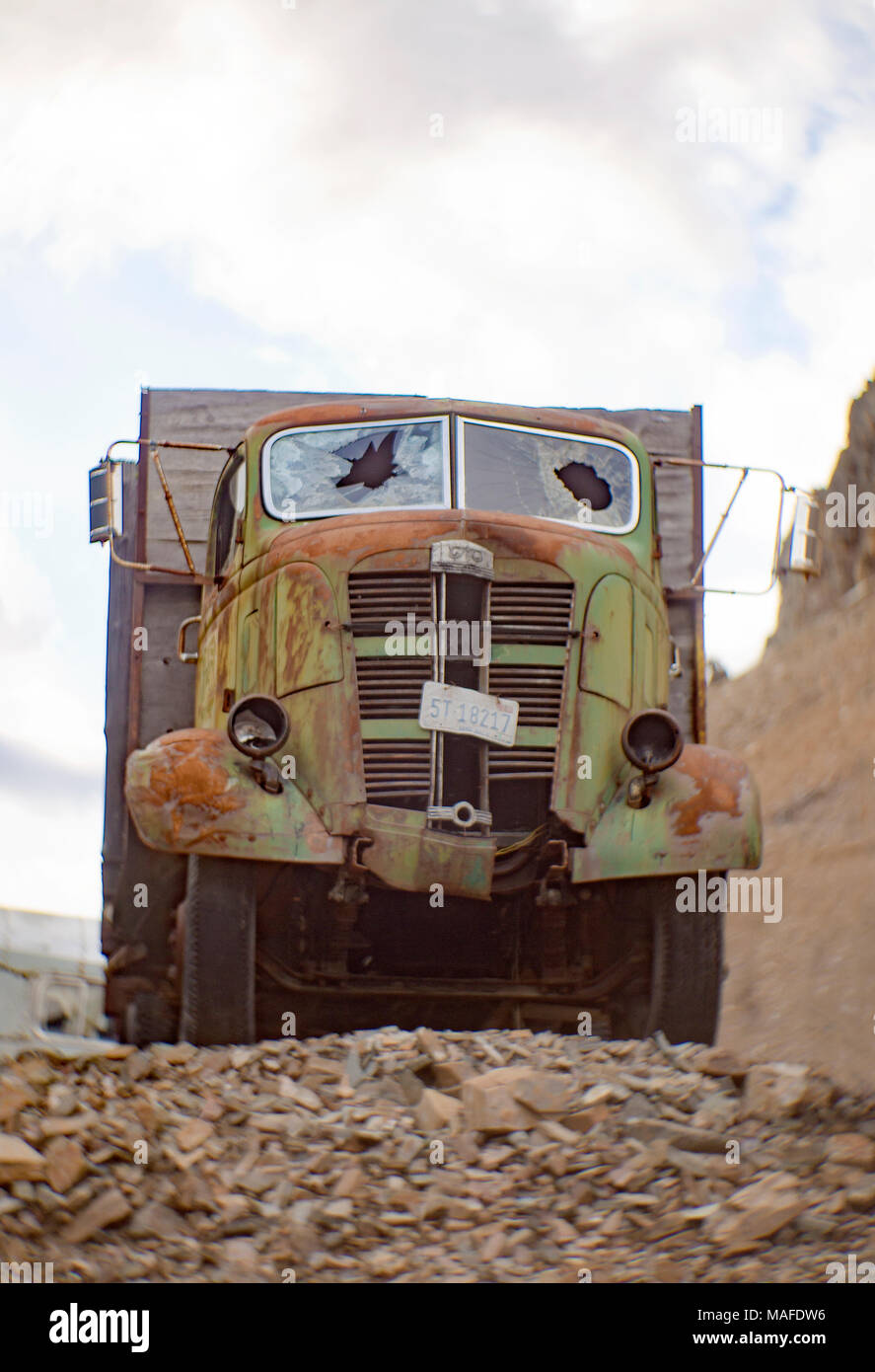A green 1937 GMC cabover truck, in an old stone quarry, east of Clark ...