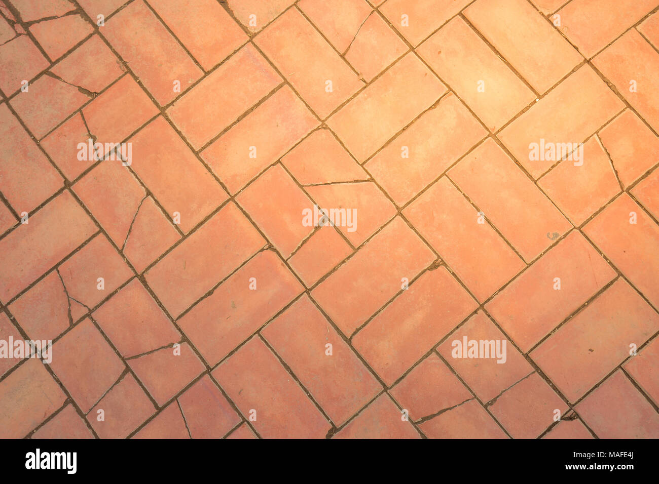 brick platform beside beach with sunset Stock Photo - Alamy