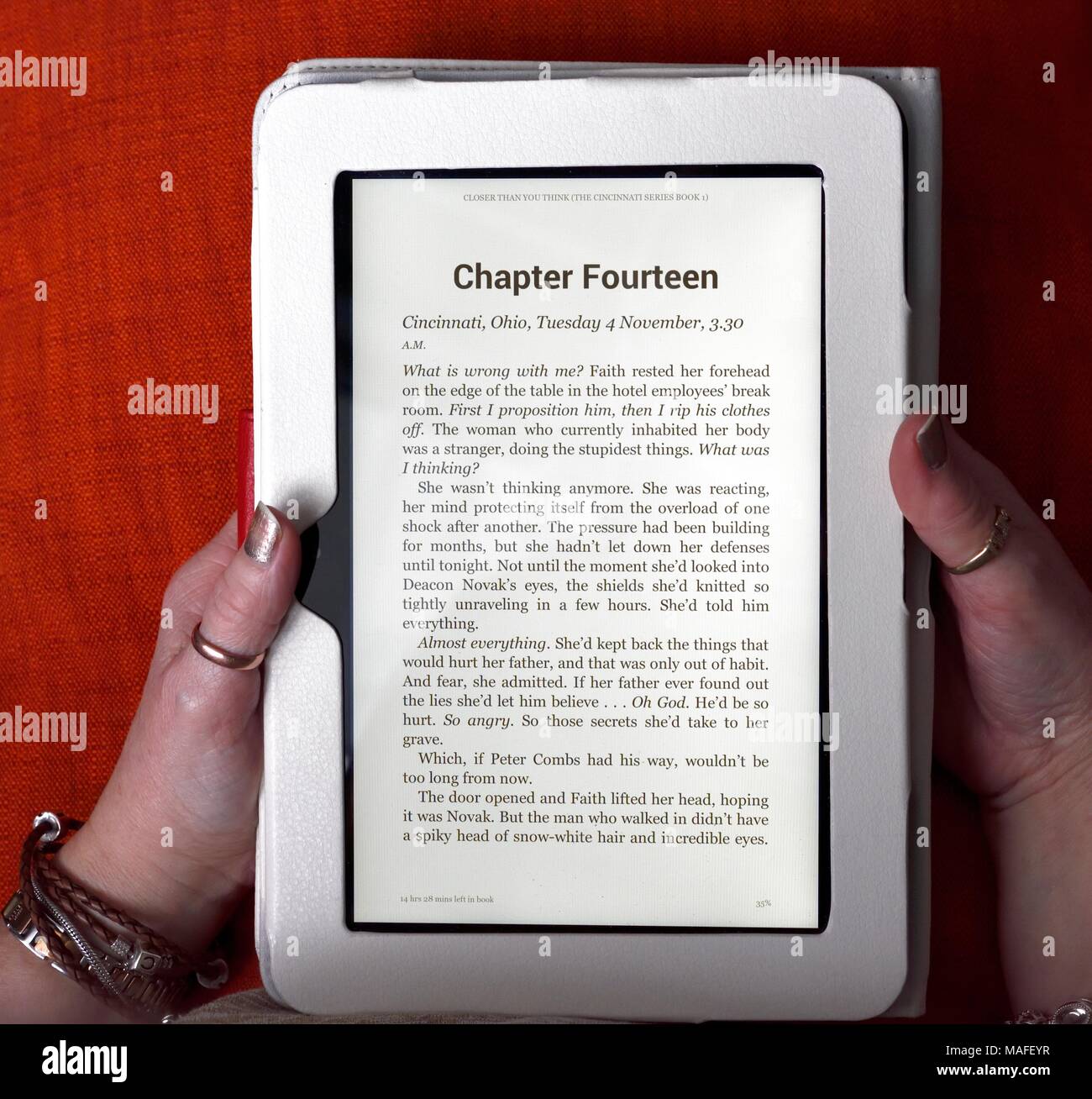 Hand holding electronic book hi-res stock photography and images - Alamy