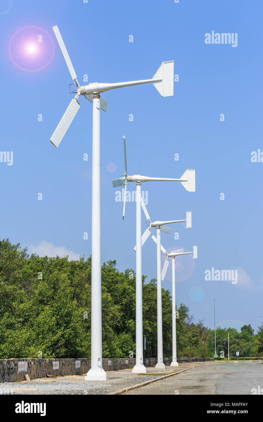 Windmill for electric power production with flare Stock Photo - Alamy
