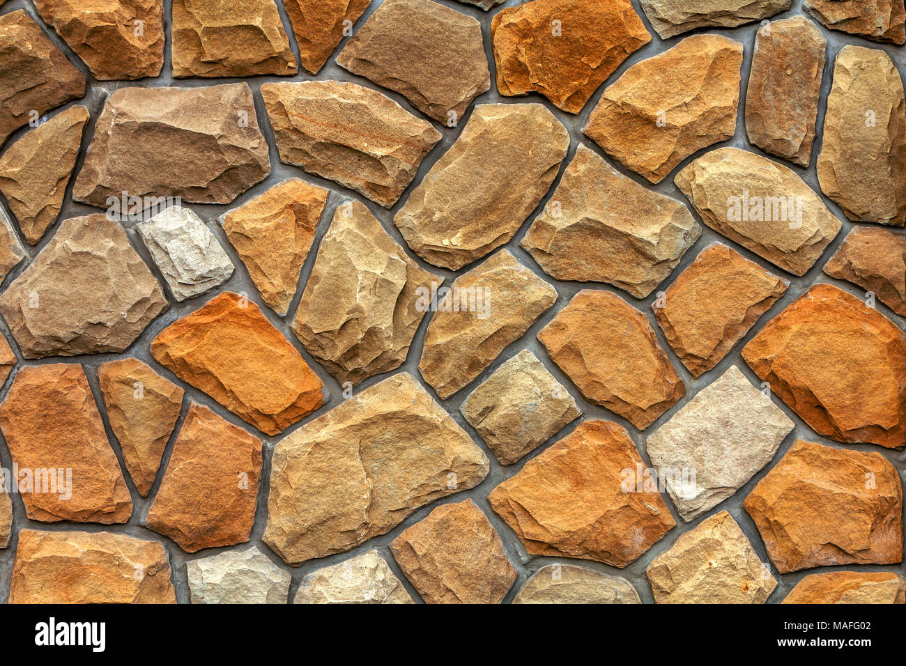 Different sizes of sand stones. Stone wall pattern background Stock ...
