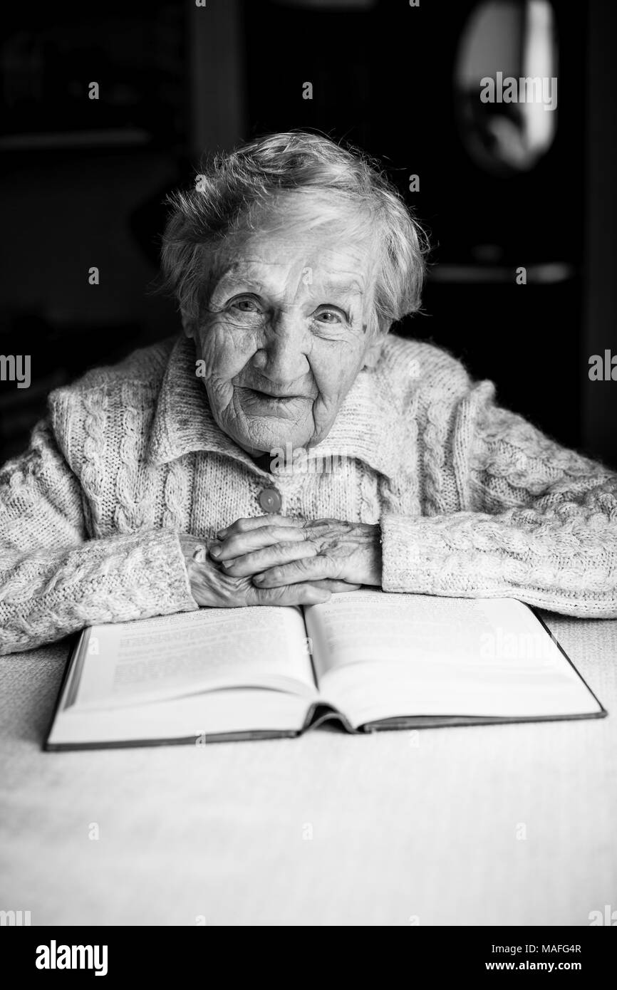 Woman pensioner sitting hi-res stock photography and images - Alamy