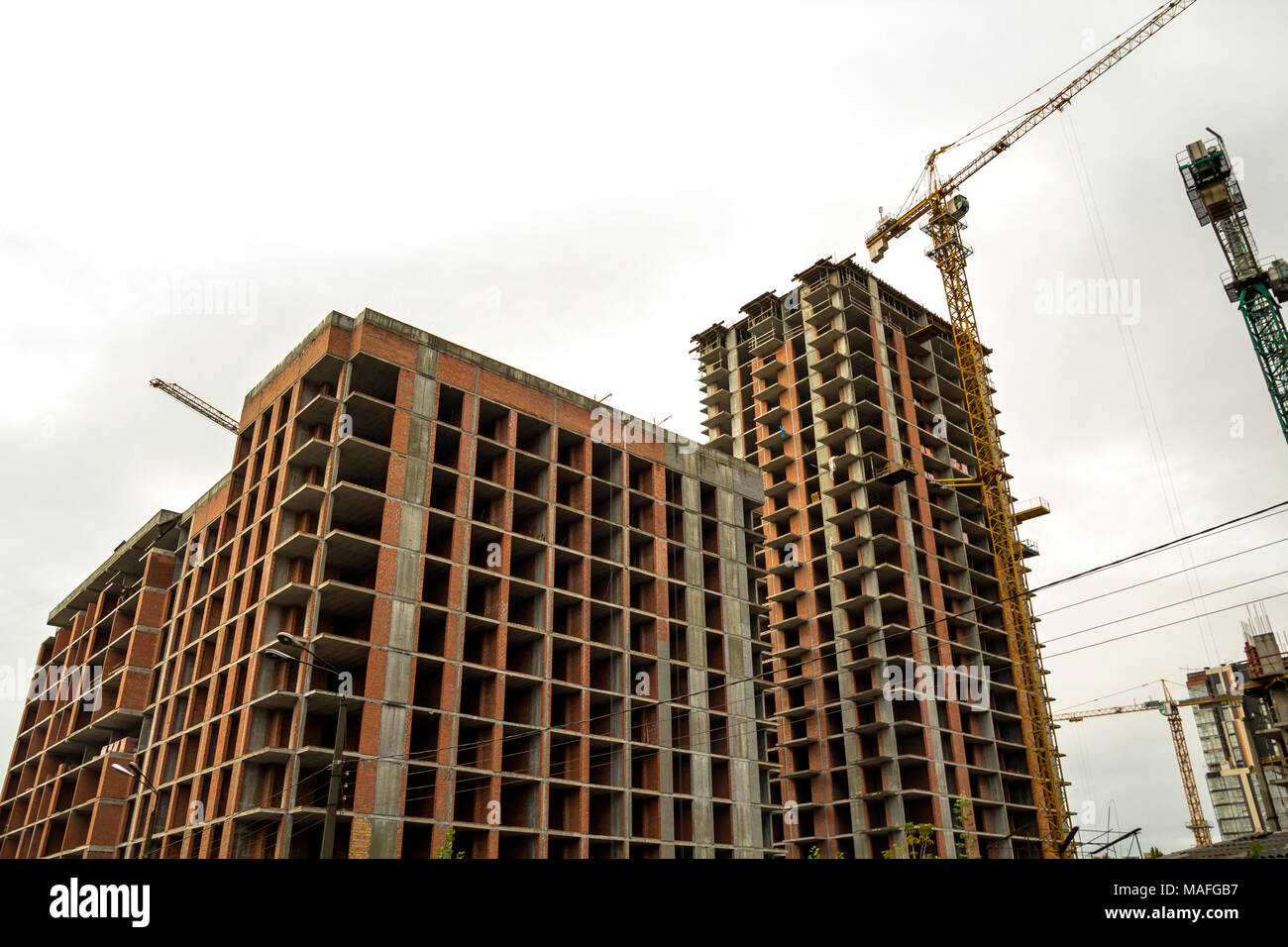 Ground view of a new modern residential house building under ...