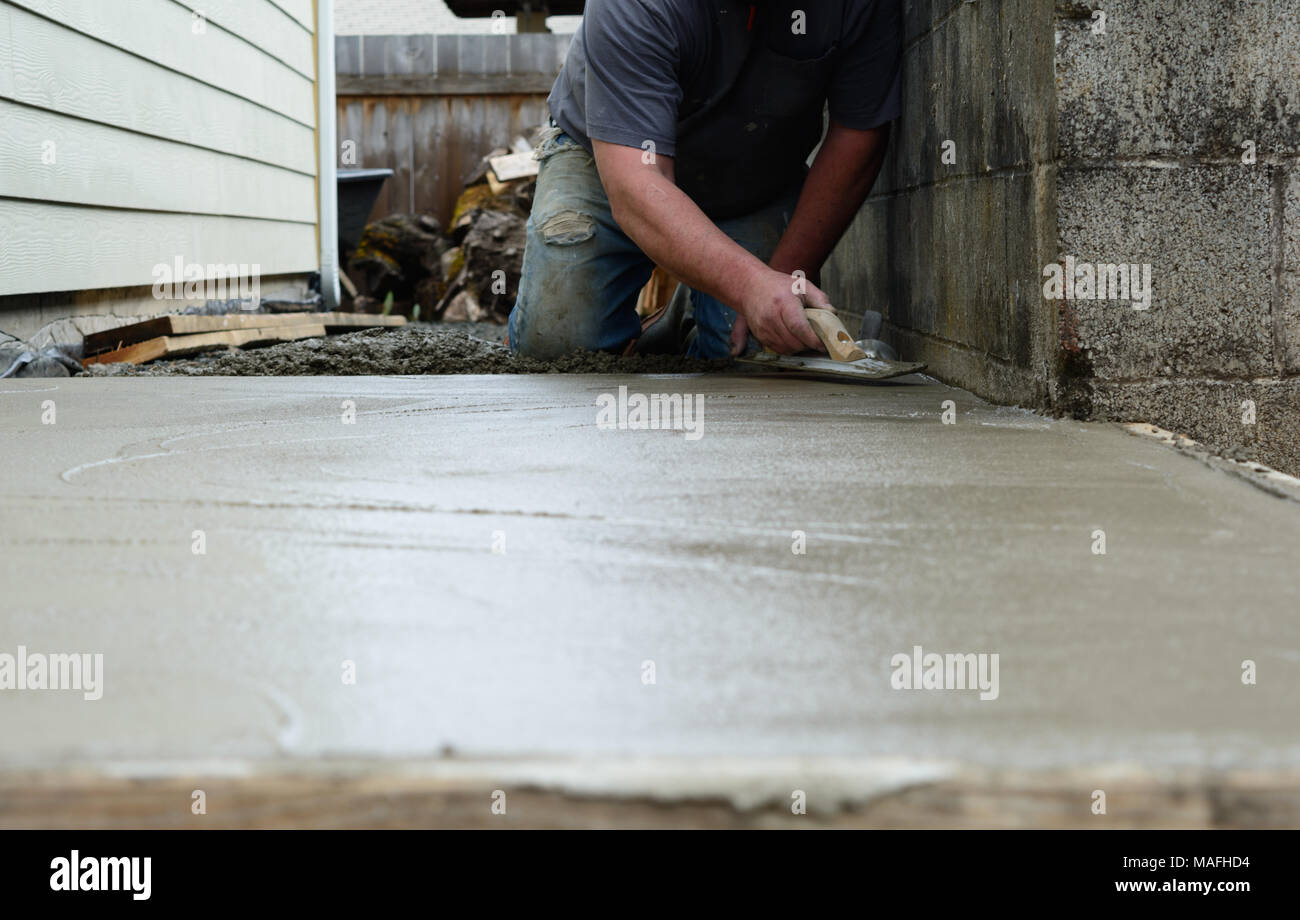 Troweling is tedious Stock Photo - Alamy