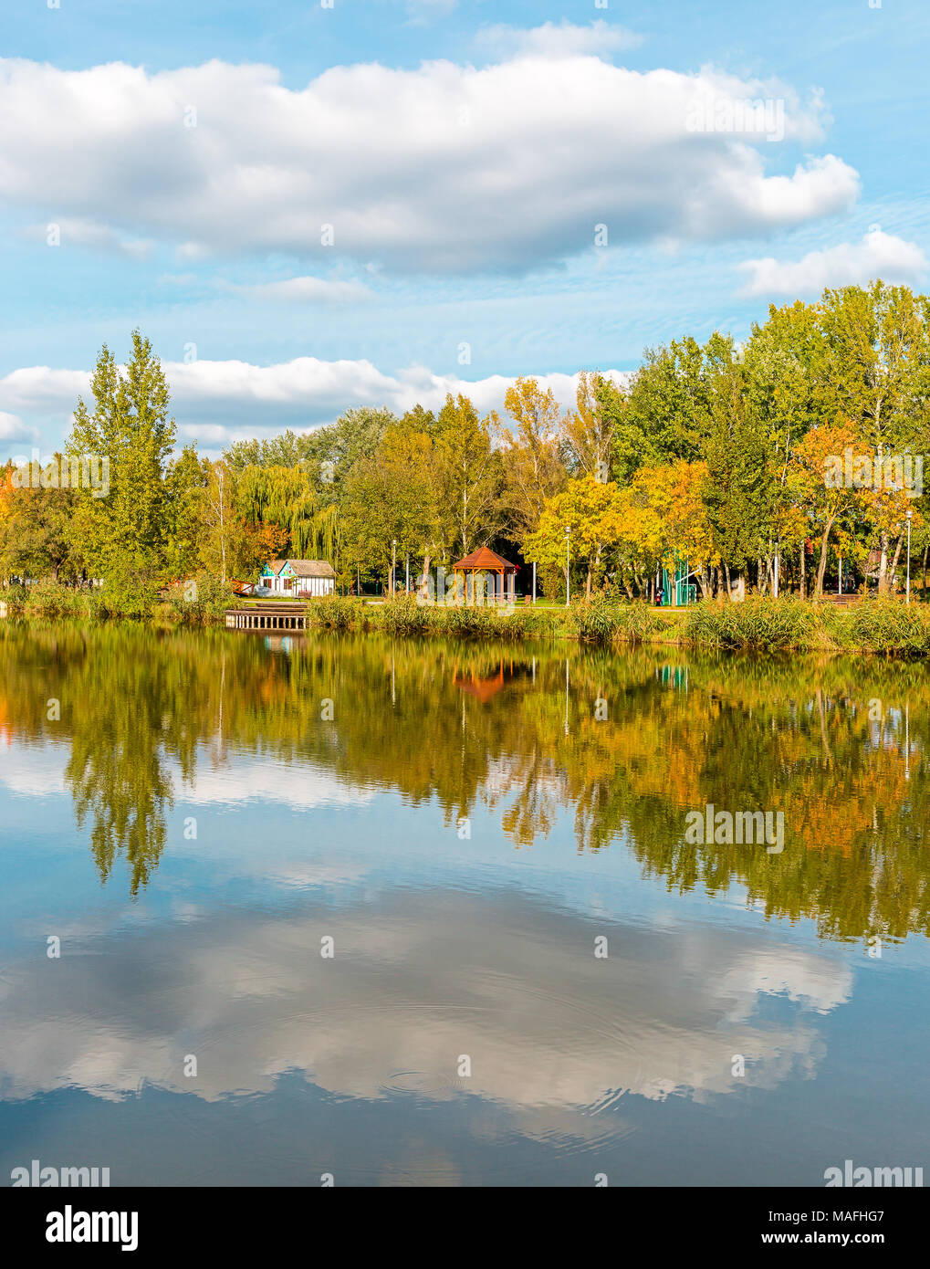 Reflections of clouds on the surface of the lake hi-res stock ...